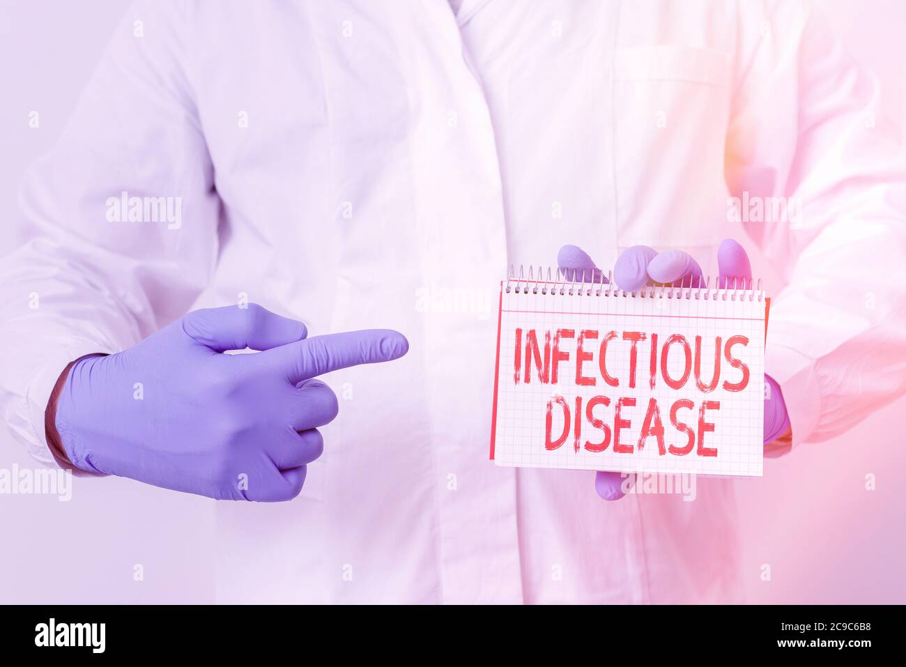 Writing note showing Infectious Disease. Business concept for caused by ...