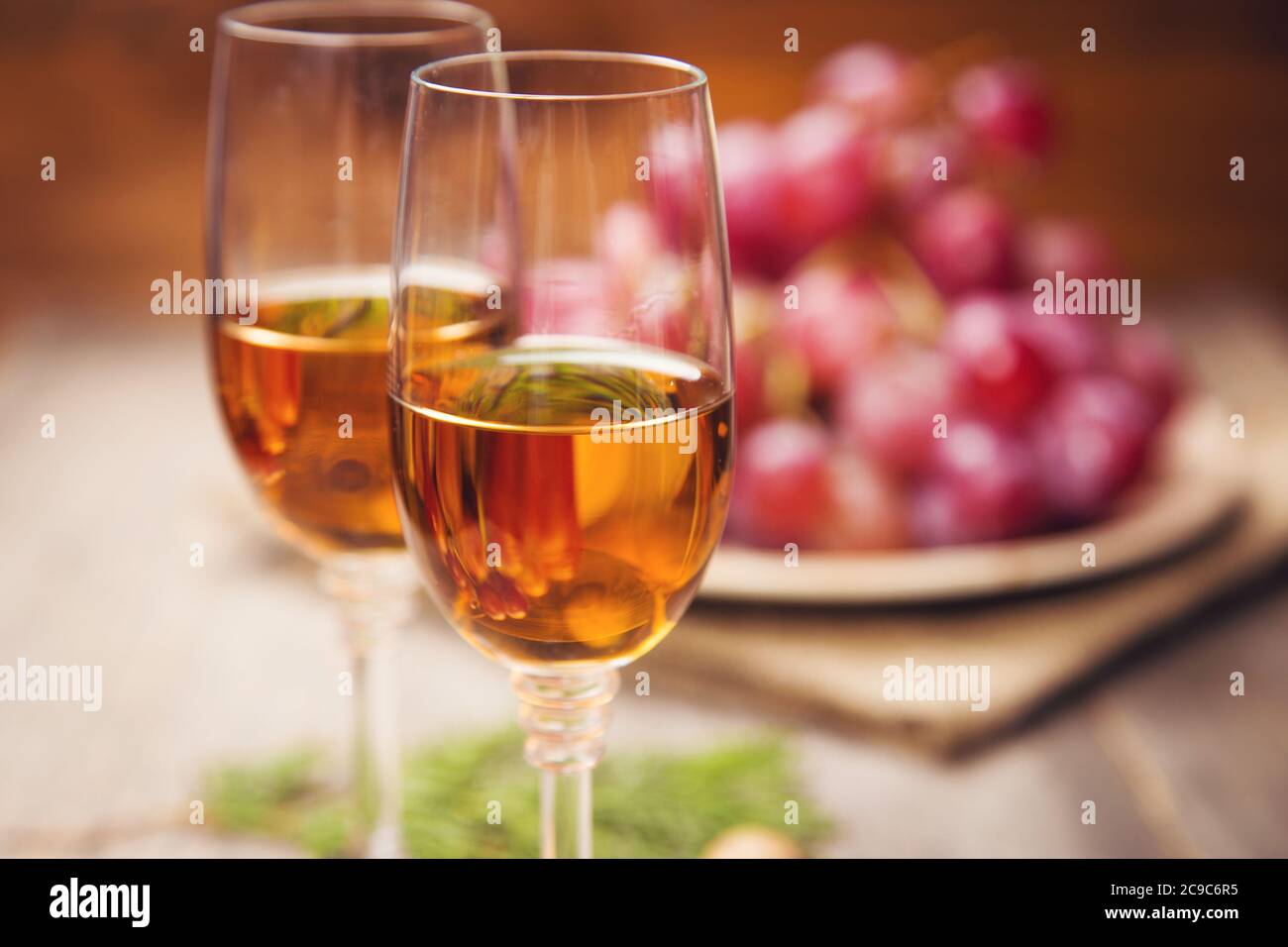 red raw ripe grape on plate and wine Stock Photo - Alamy