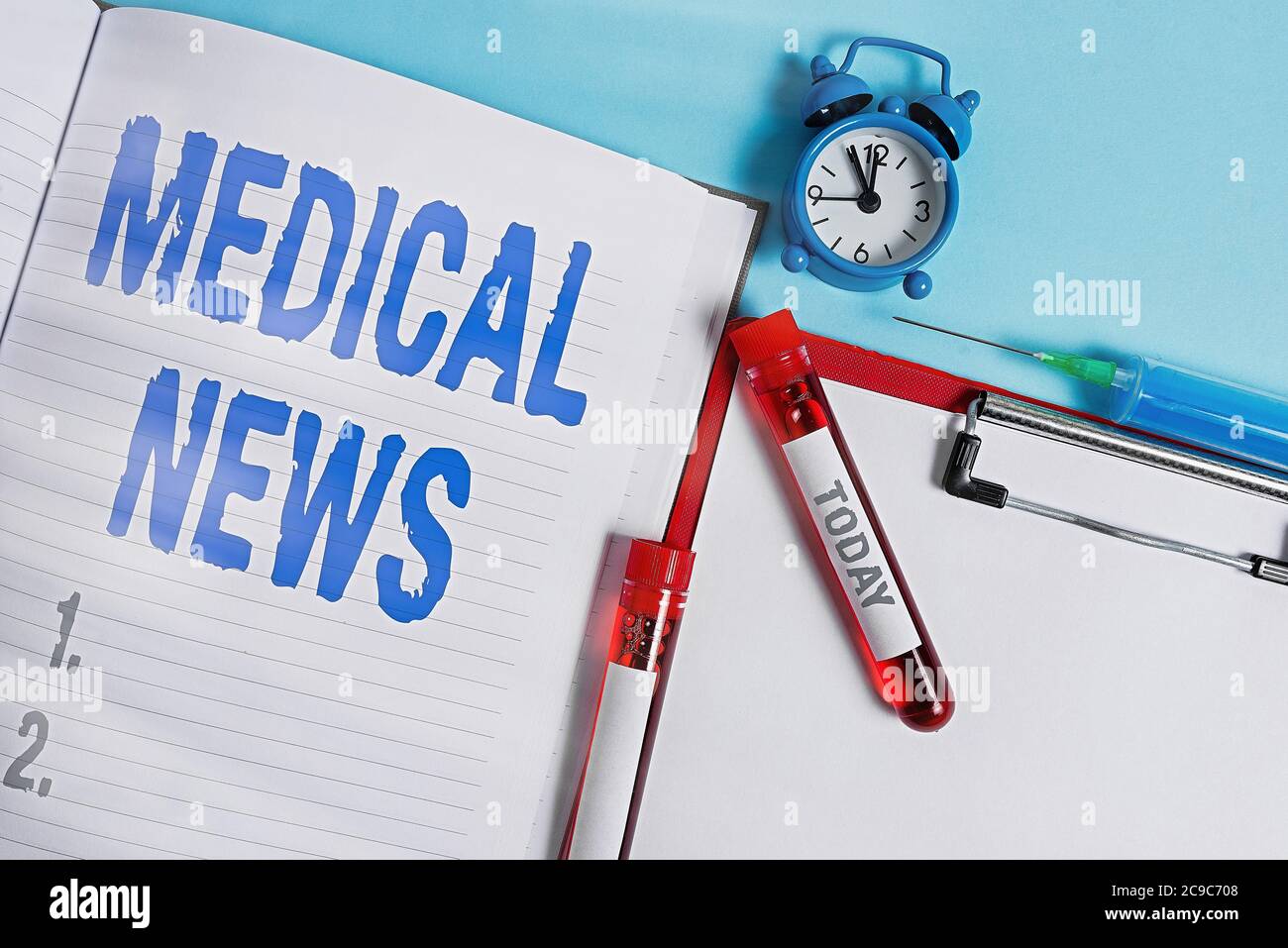 Writing note showing Medical News. Business concept for report or ...