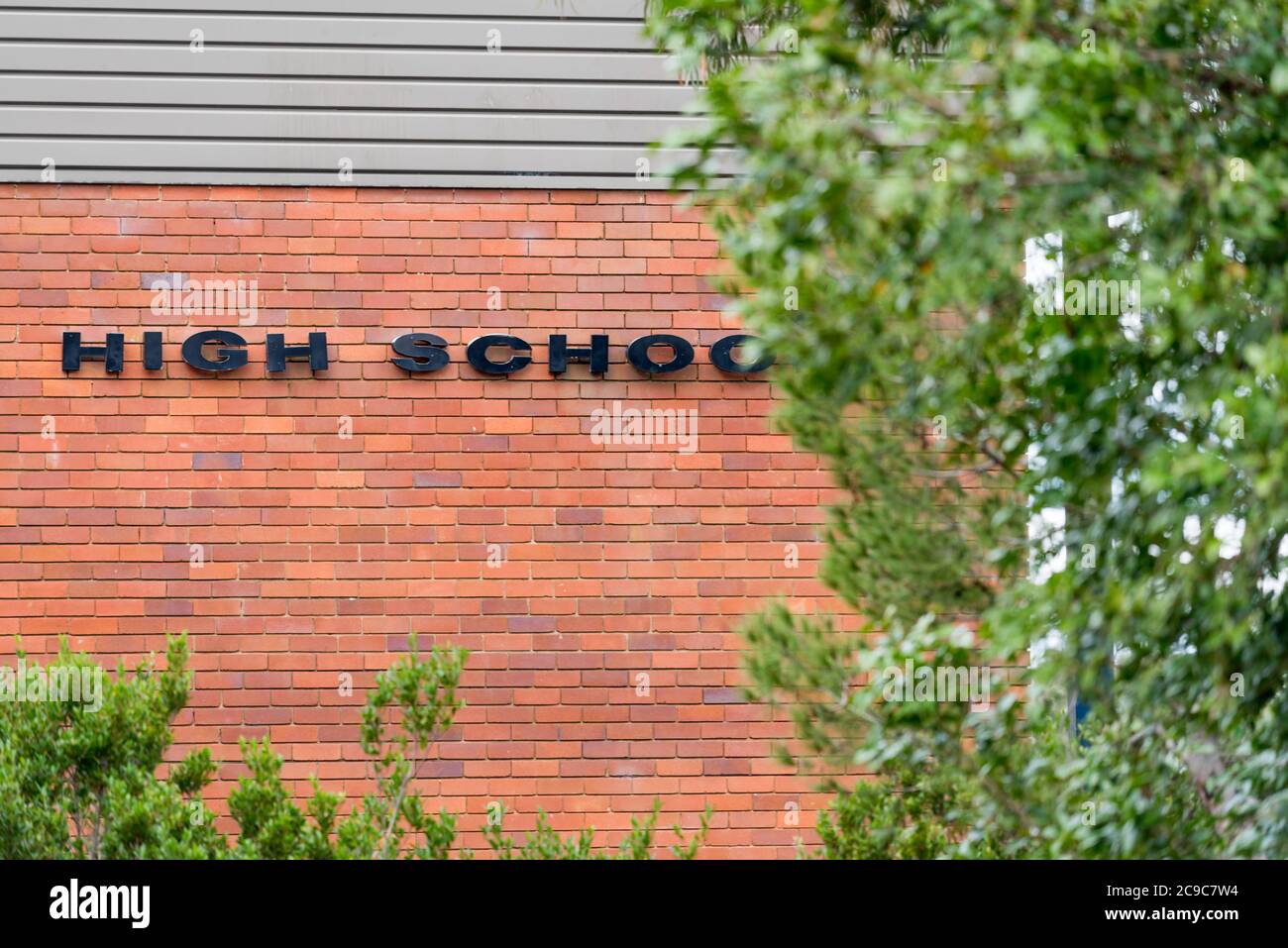 The side of a school building in Sydney with the words High School ...