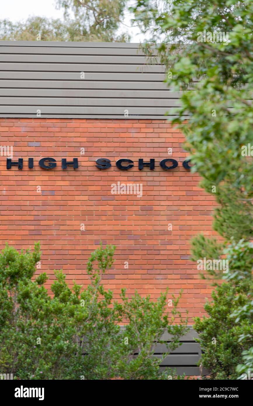 The side of a school building in Sydney with the words High School ...