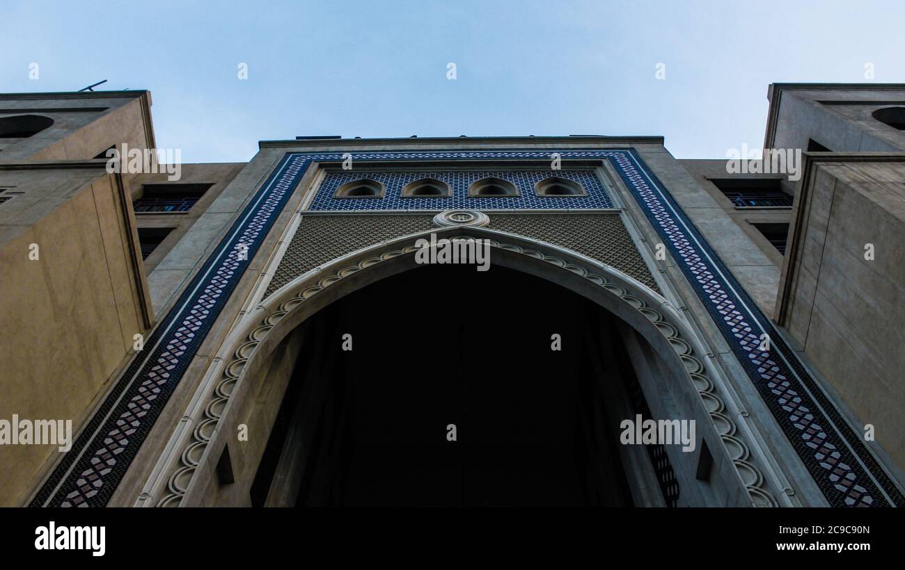 classic symmetrical arab architecture building with mosaic in Dubai ...