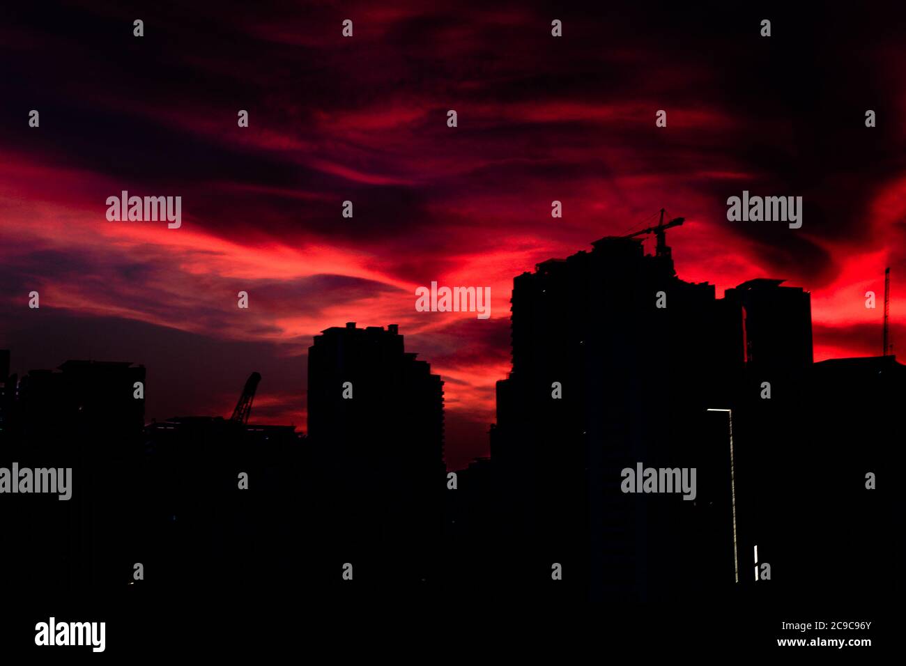 red sky around sunset time in sharjah, united arab emirates Stock Photo ...