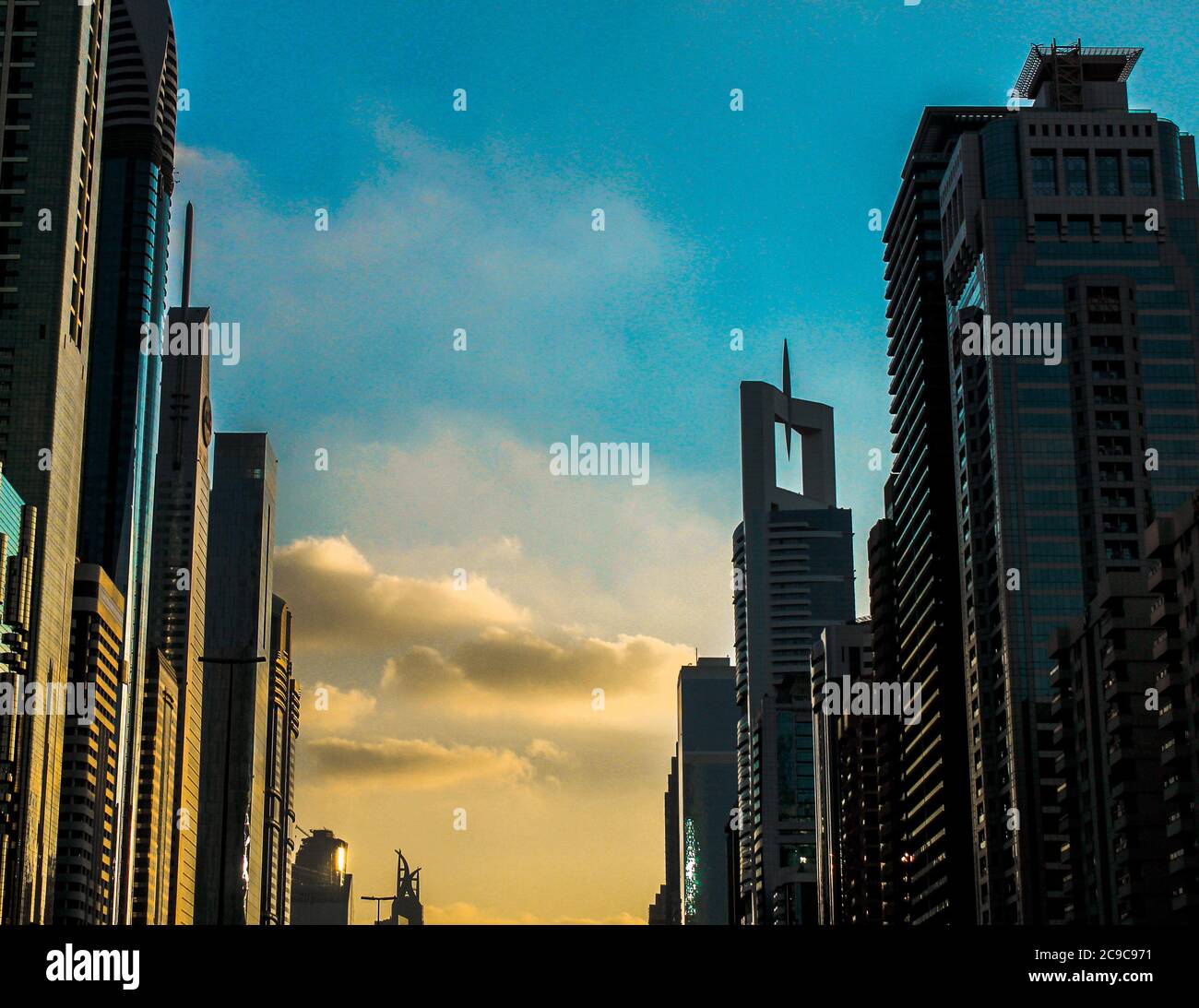 symmetrical photo of dubai, united arab emirates, skyline around golden ...