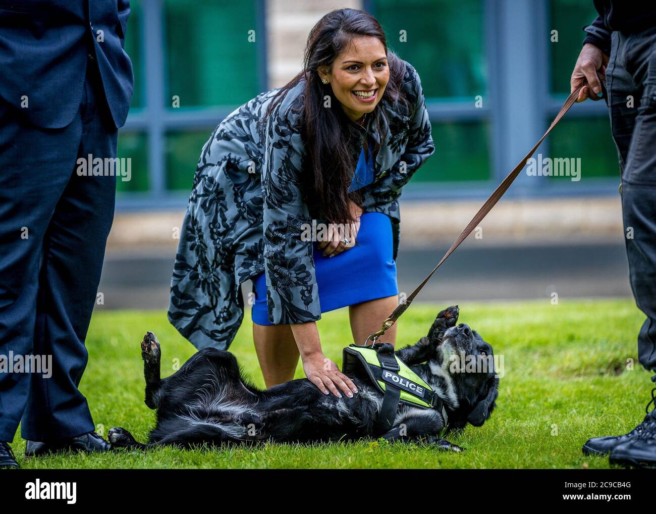 Home Secretary Priti Patel stroking Police Dog Toby during a visit to ...