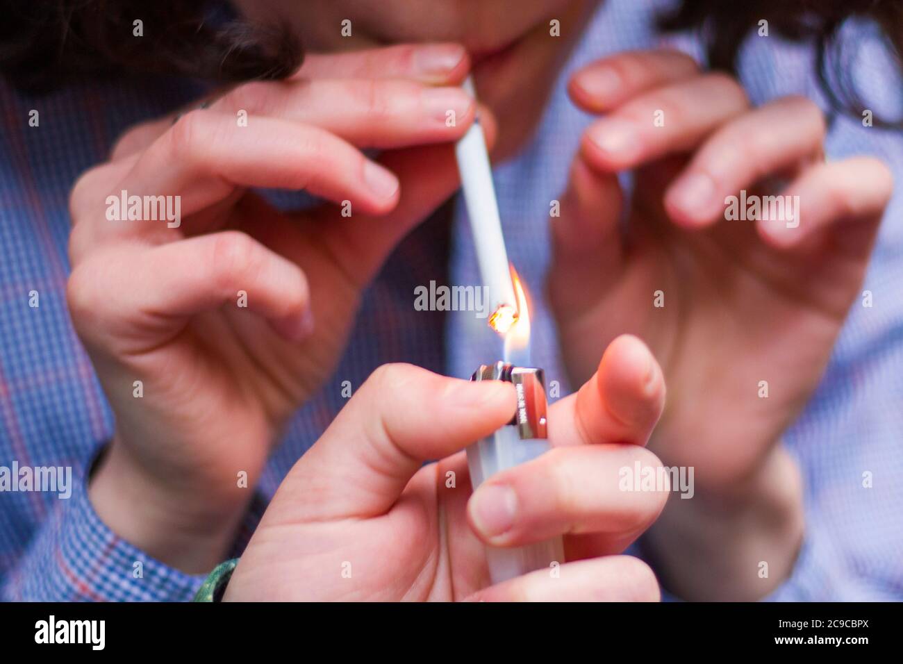 Cigaret smoking scene, young woman smoke cigarette. hands and mouth ...