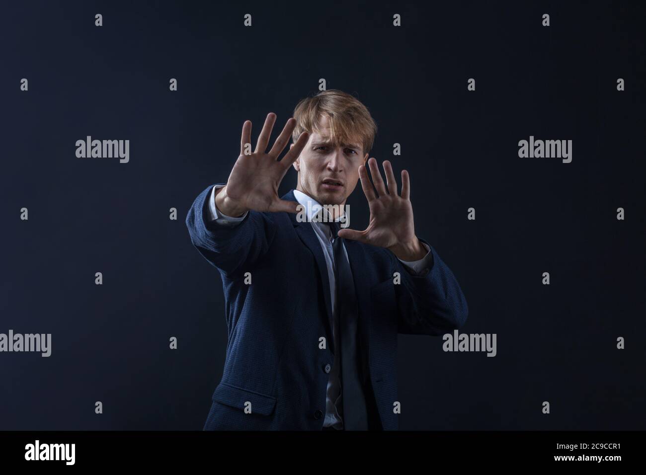 Hand stop suit hi-res stock photography and images - Alamy