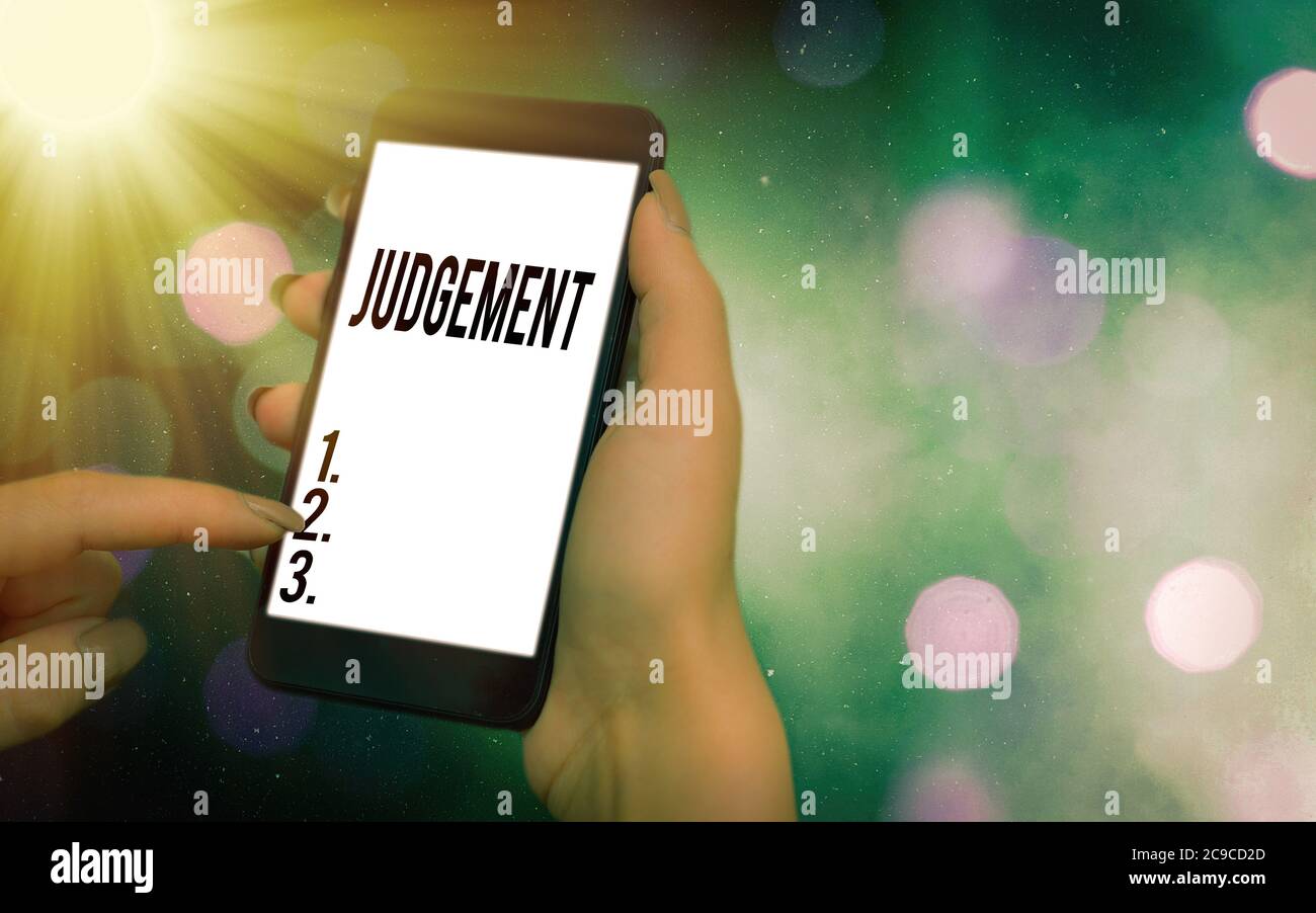 Conceptual hand writing showing Judgement. Concept meaning process of ...