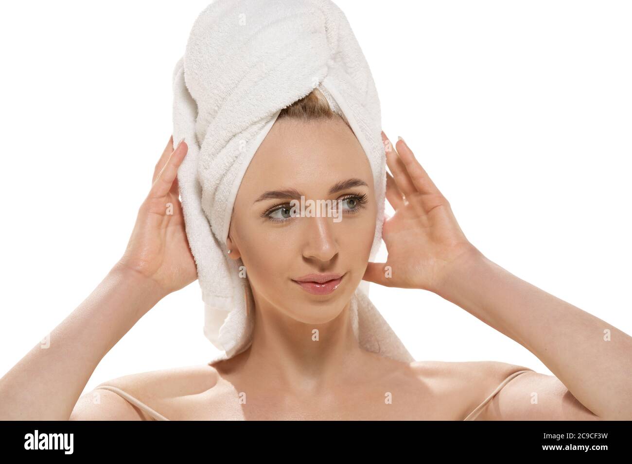 Beauty Day. Young caucasian woman wearing towel during her daily ...