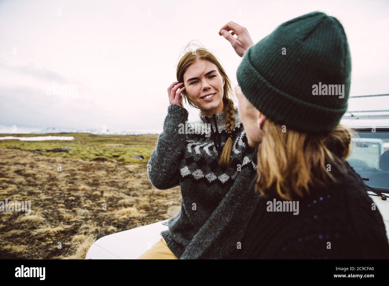 Couple making a wanderlust vacation, exploring iceland with their 4x4 ...