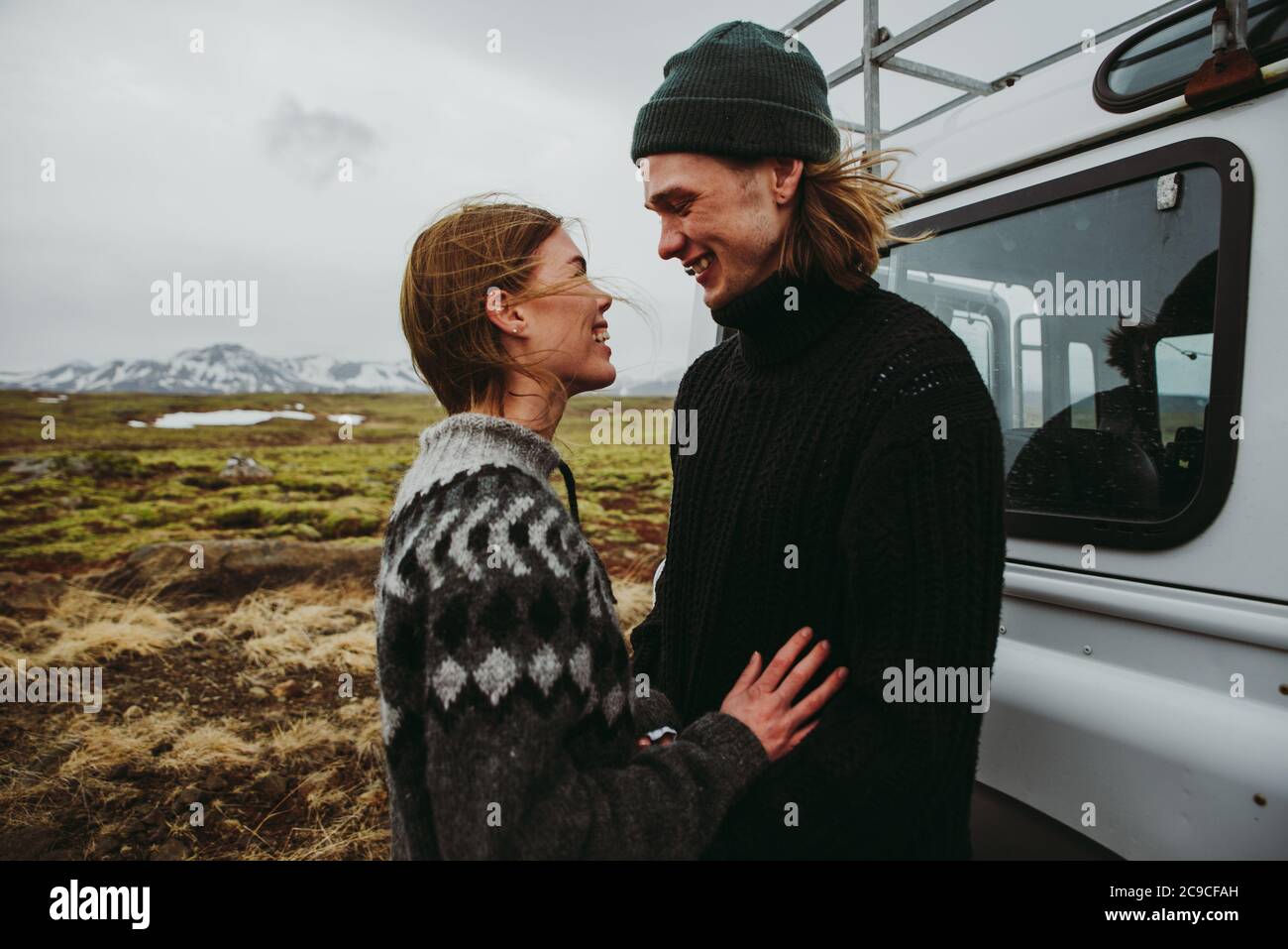Couple making a wanderlust vacation, exploring iceland with their 4x4 ...