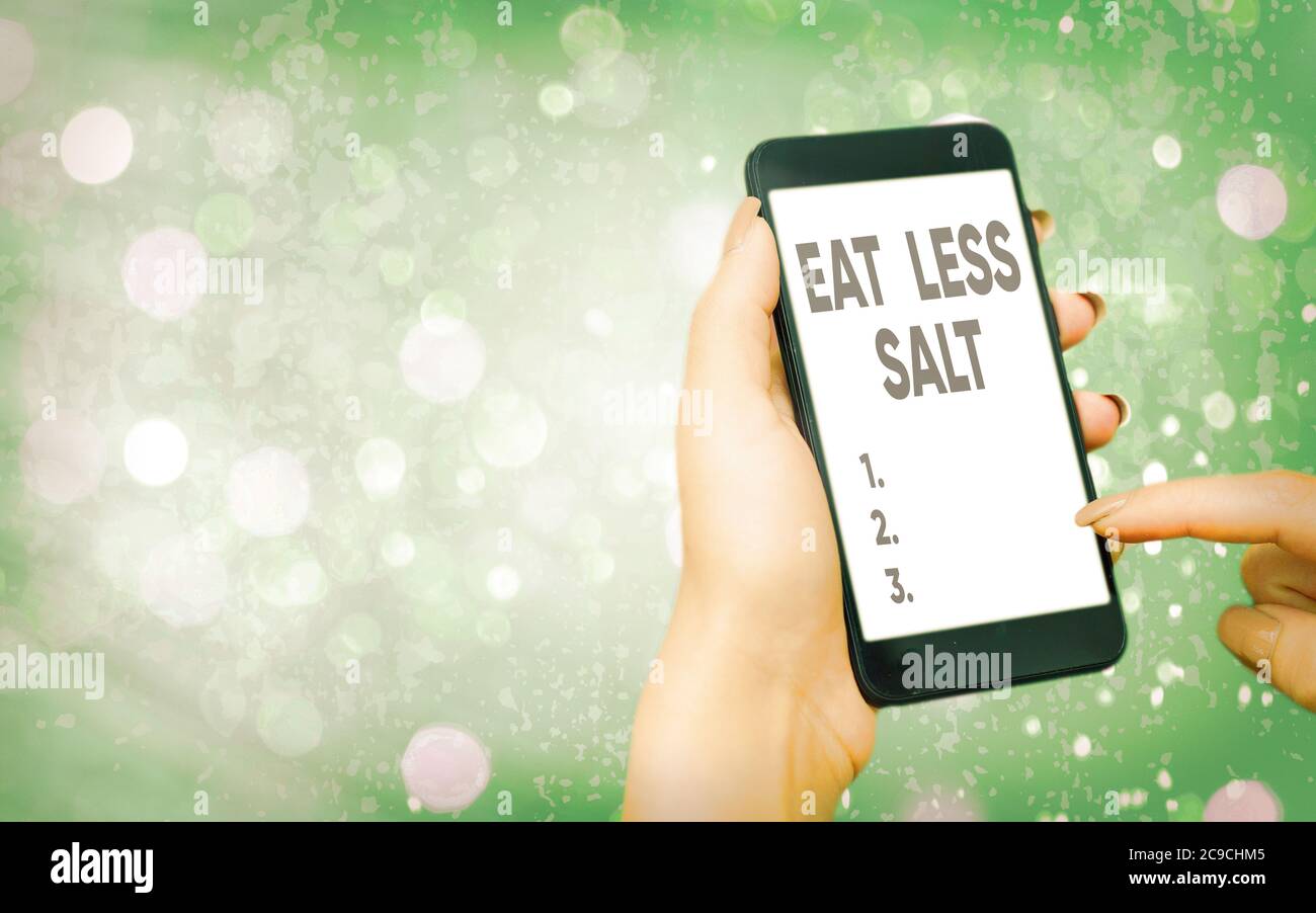 Text sign showing Eat Less Salt. Business photo text reducing the ...