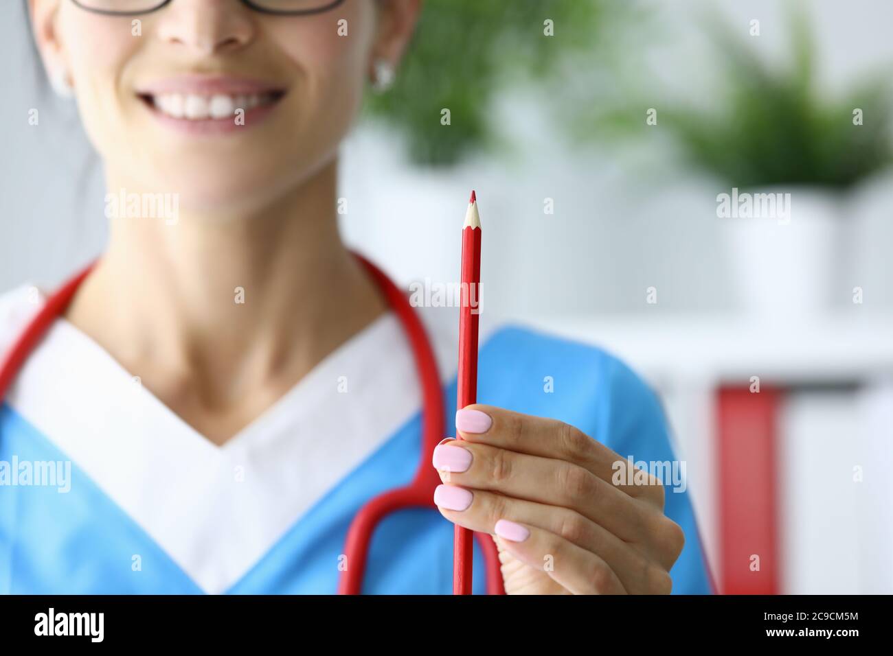 Woman holds red warning hi-res stock photography and images - Alamy
