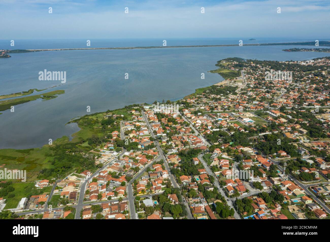 Cities near the sea and lagoon Stock Photo - Alamy