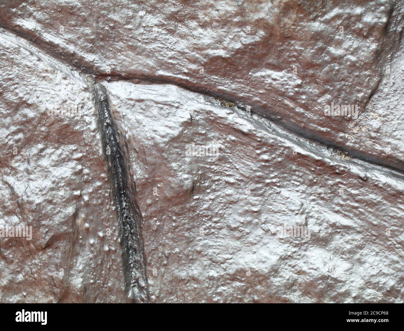 Old stone wall with metallic silver paint as texture, background Stock ...