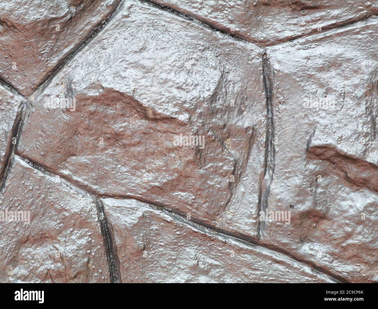 Old stone wall with metallic silver paint as texture, background Stock ...