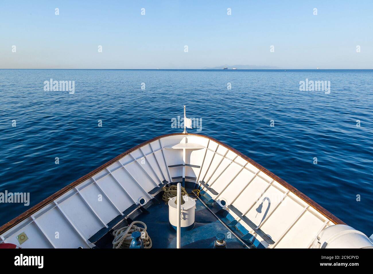 Ship in open sea is showing the bow in a summer day Stock Photo - Alamy