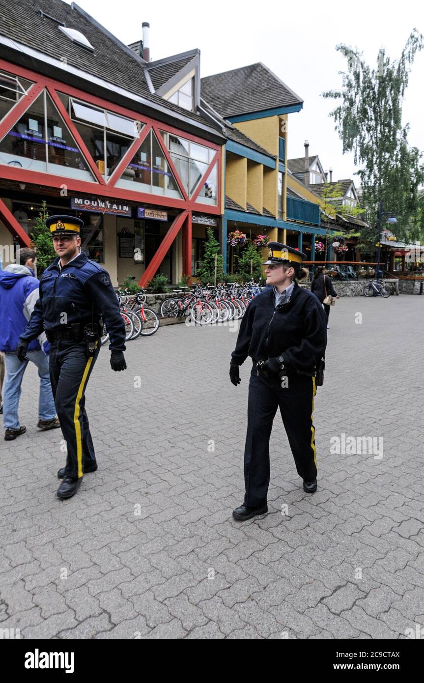 Two Police officers on foot patrol in Whistler, British Columbia ...