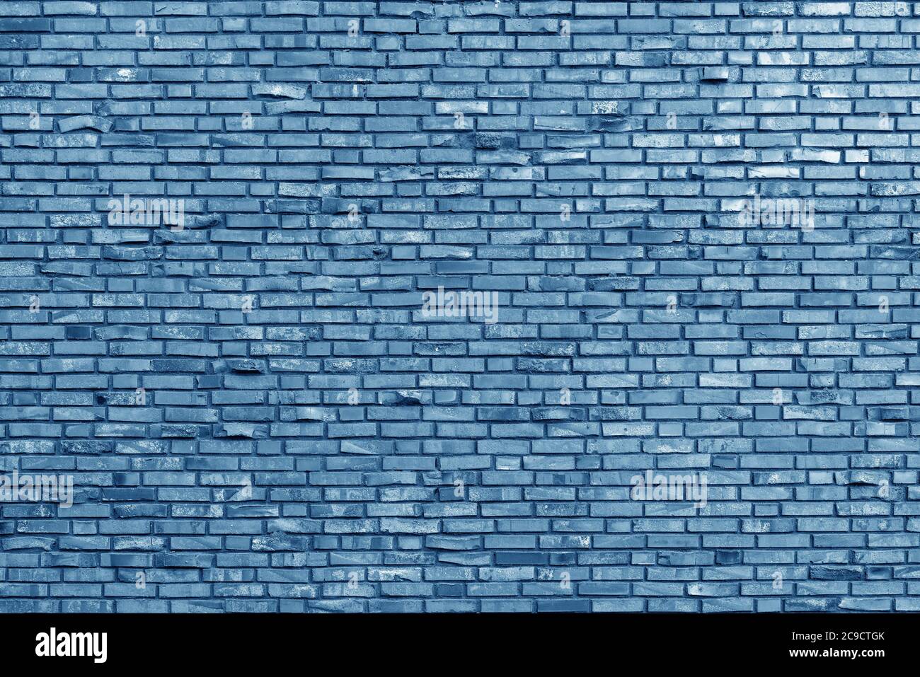 The background of the old blue brick wall for design interior and ...