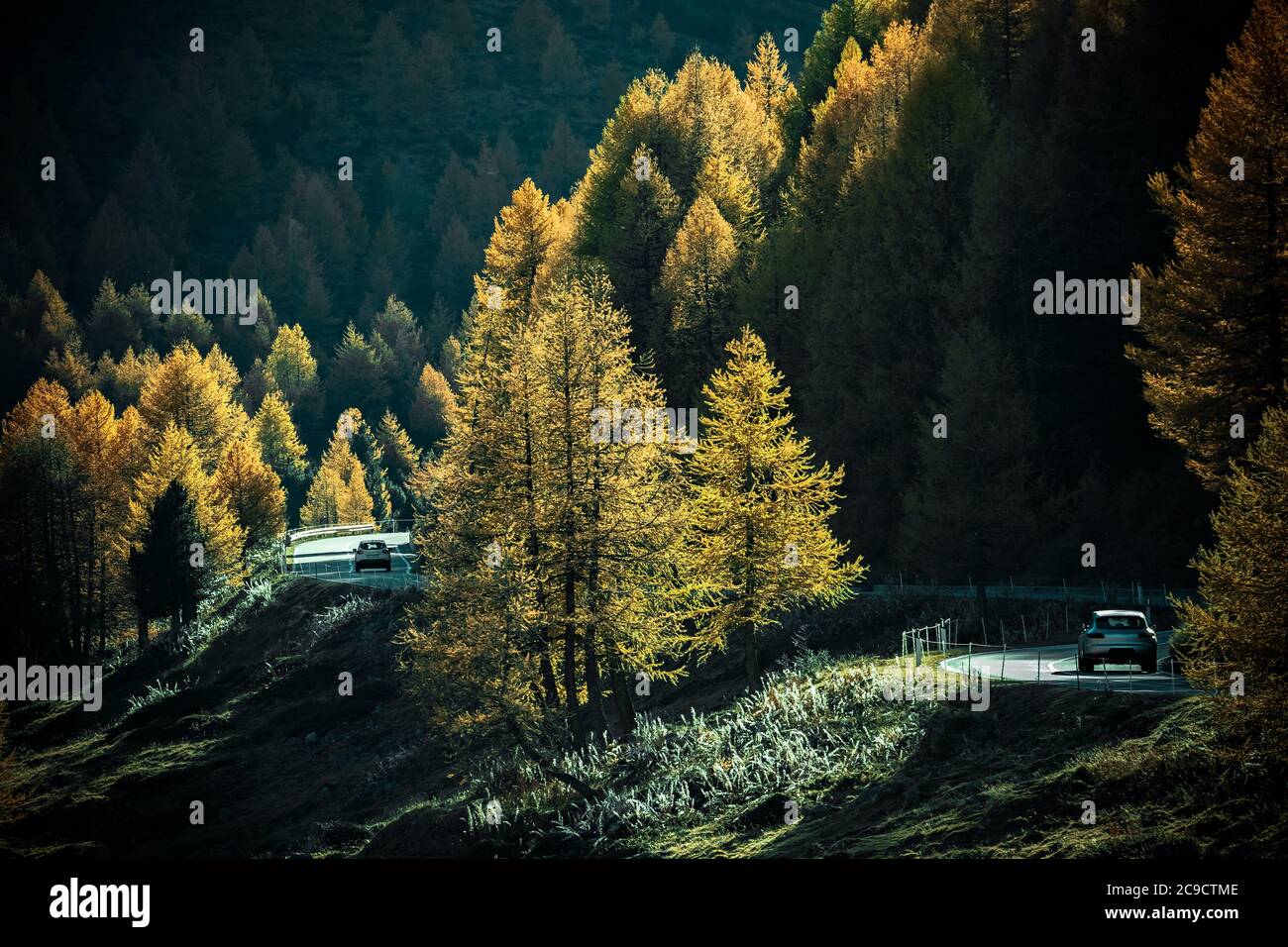 mountain road with cars - autumn Stock Photo - Alamy