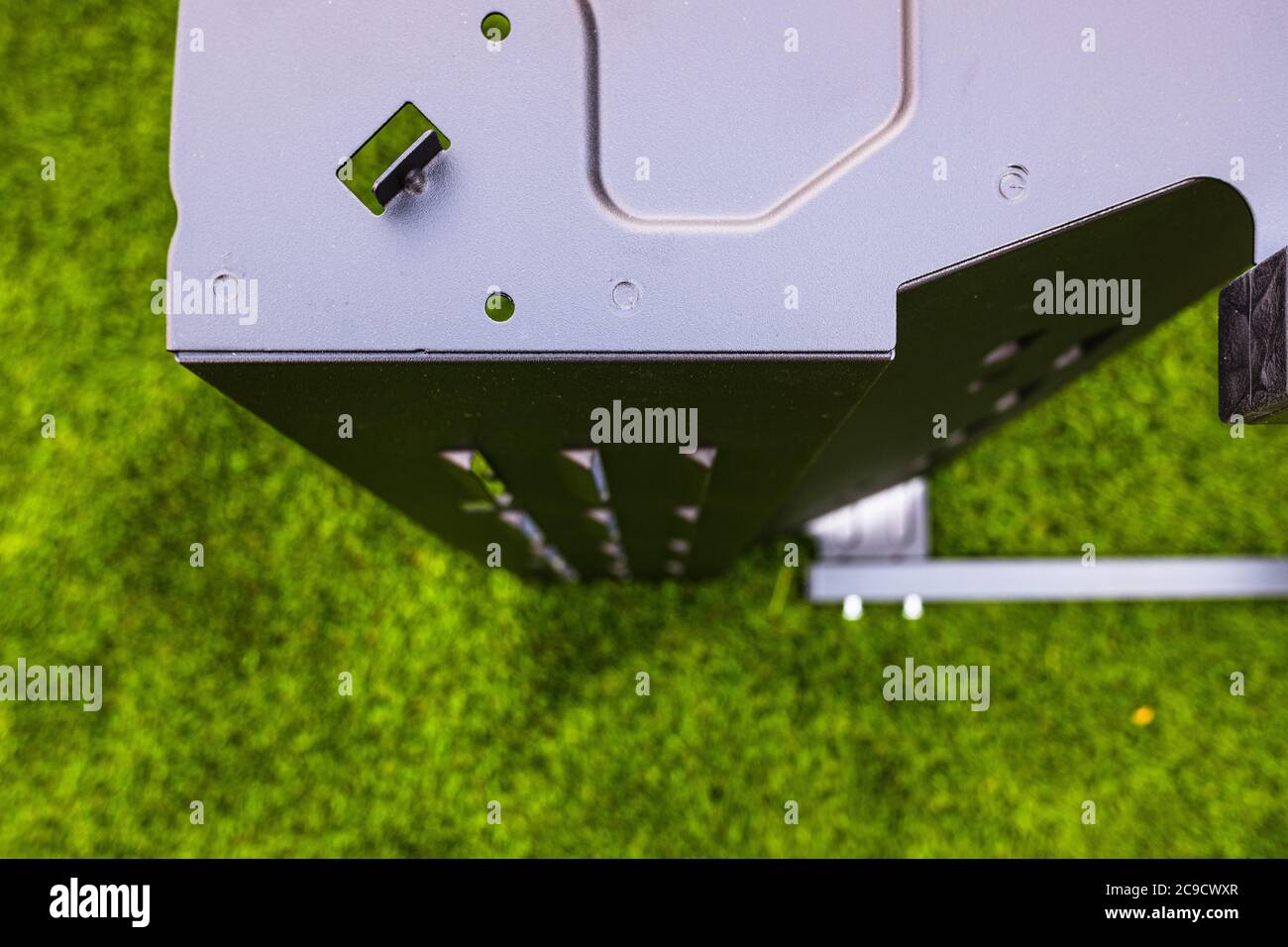 Detail of a metal barbecue during its assembly, to make outdoor grills ...
