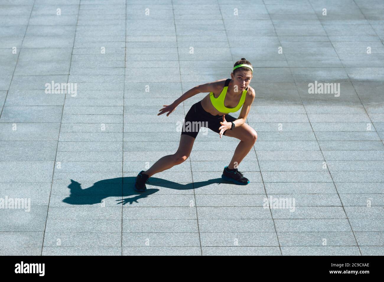 Achievement. Female runner, athlete training outdoors. Professional ...