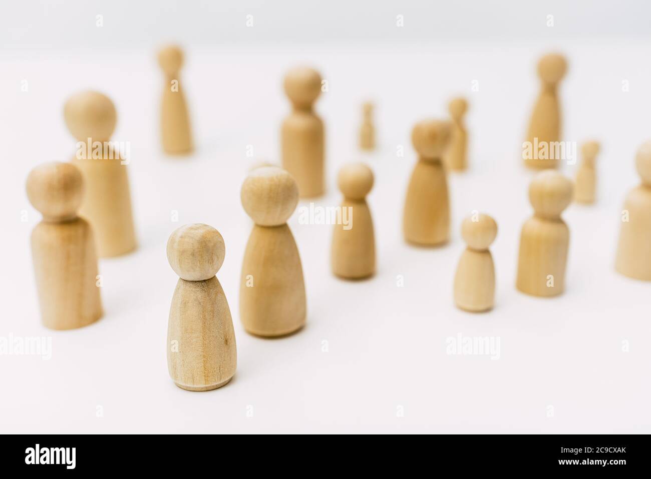 Group of confused grouped people, represented by wooden figures ...