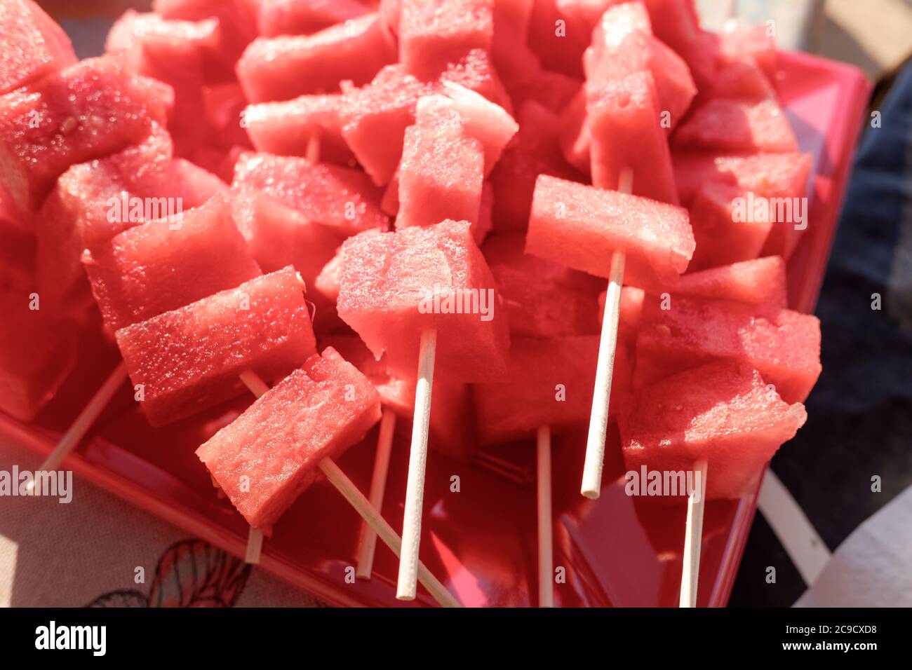 Fresh diced watermelon and skewered as a snack Stock Photo - Alamy