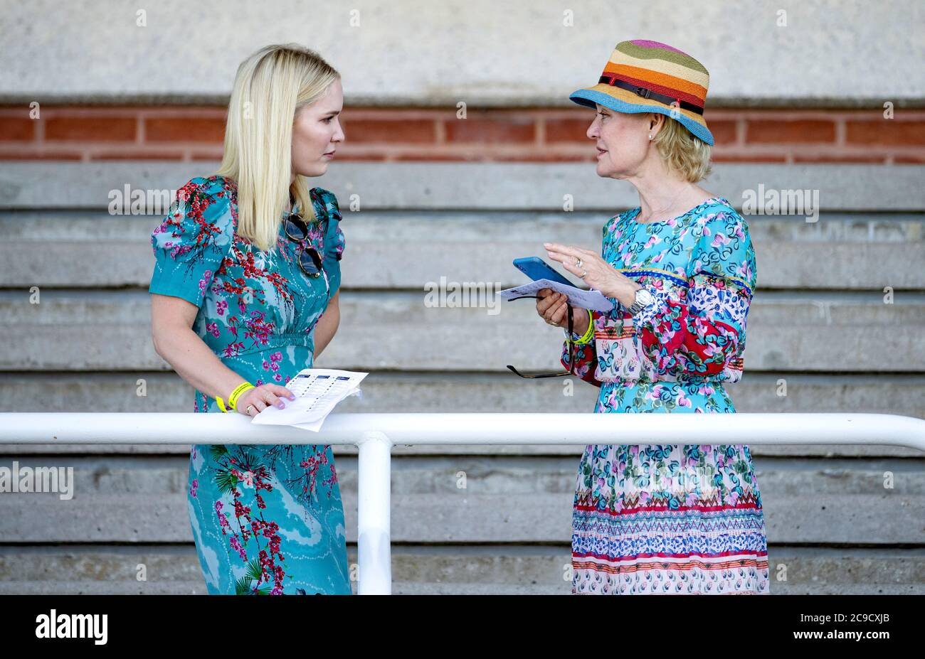 John Gosden's wife, Rachel Hood (right) in the stands during day three ...
