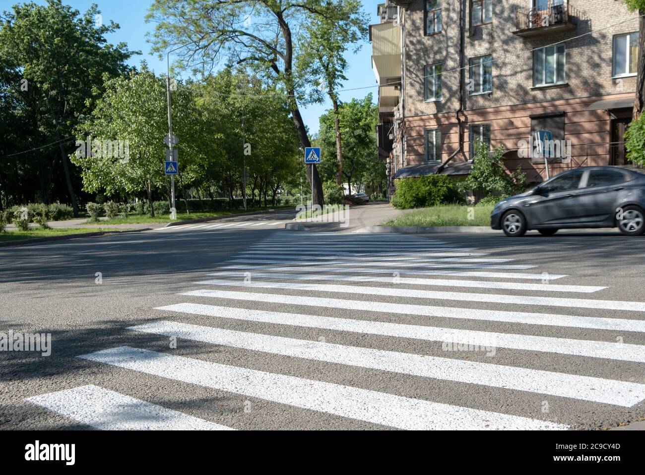 Car road pedestrian path hi-res stock photography and images - Alamy