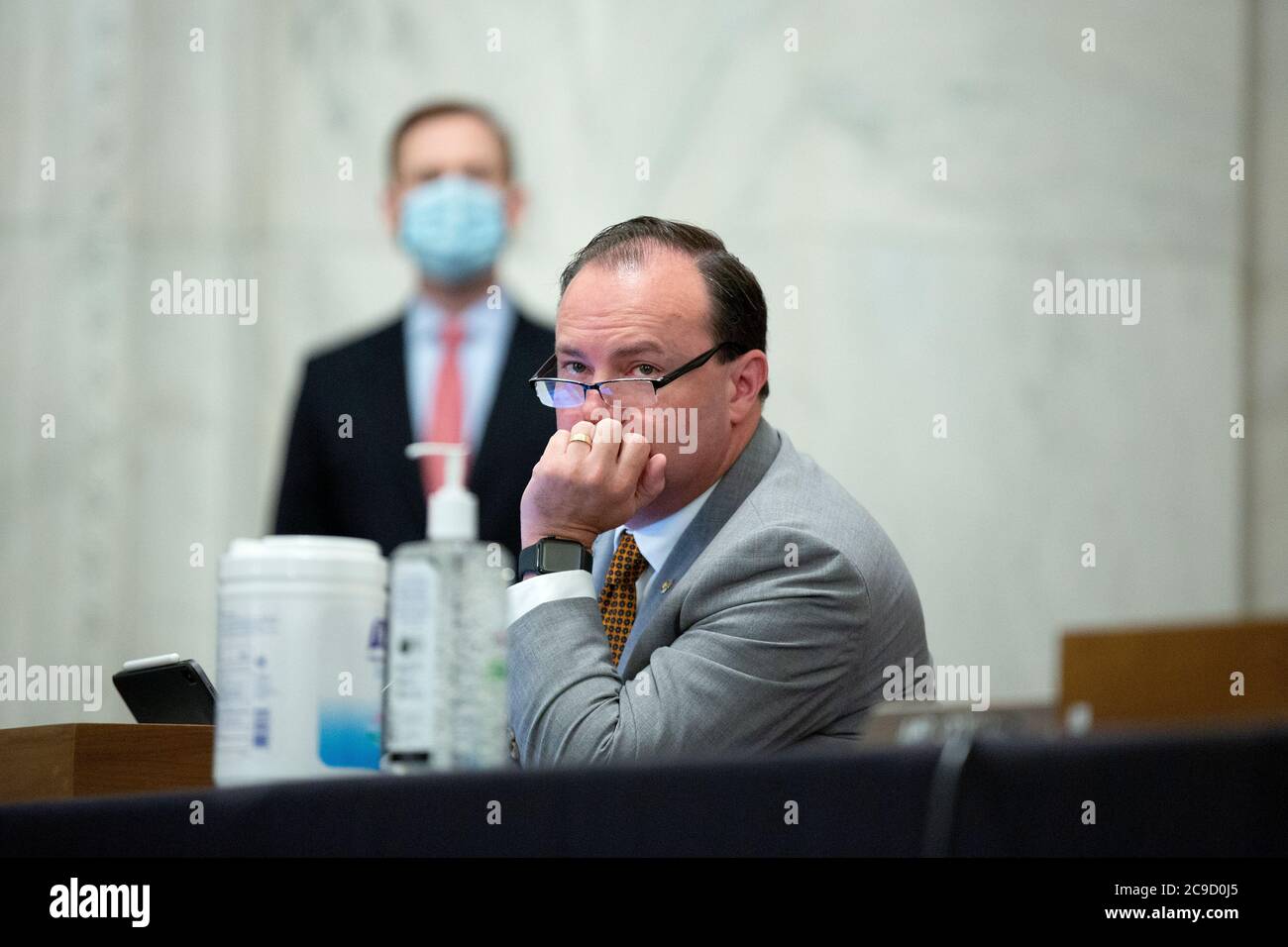 United States Senator Mike Lee (Republican of Utah) listens during a ...