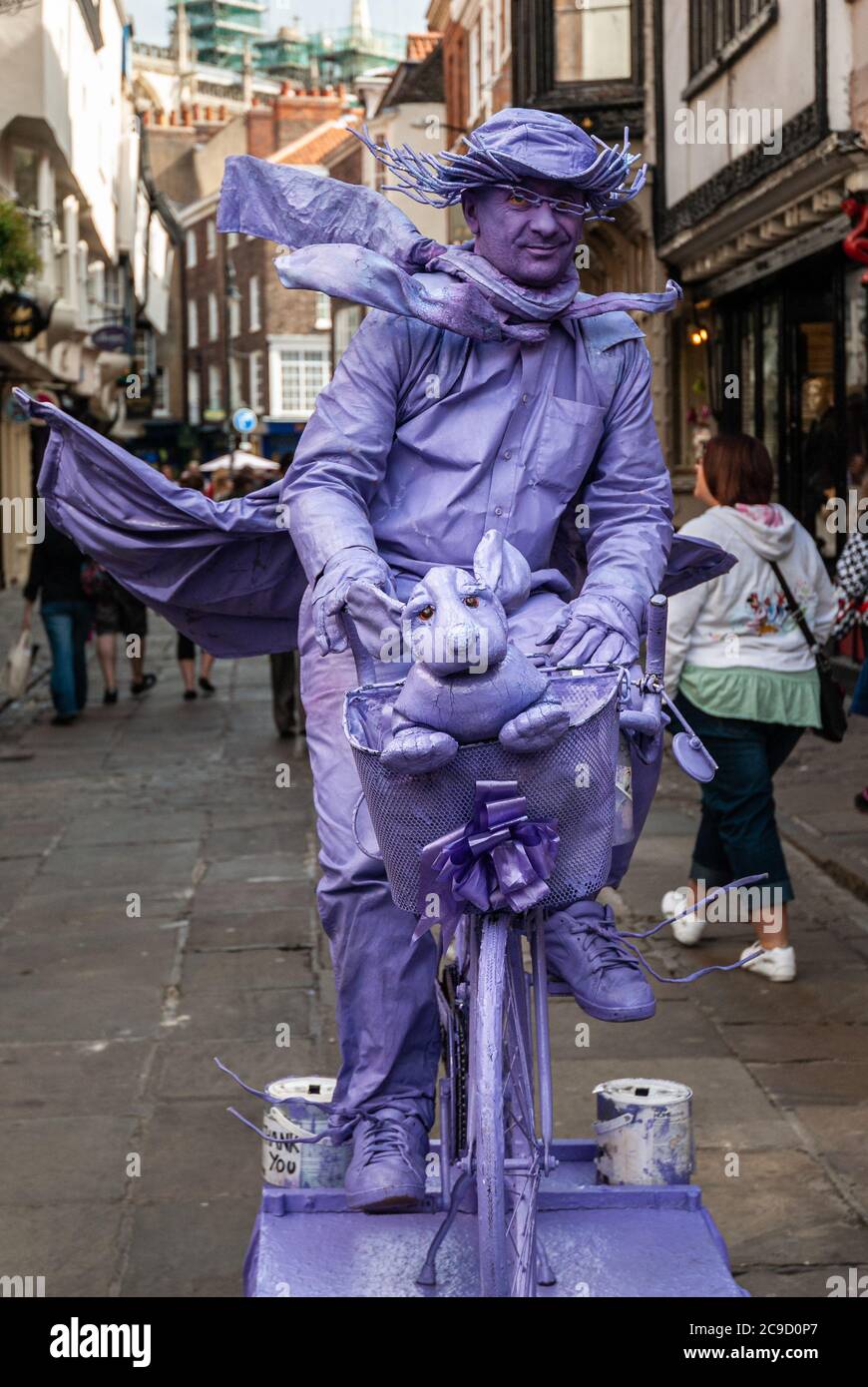 The Purple man, living statue in Stonegate, York, England Stock Photo ...