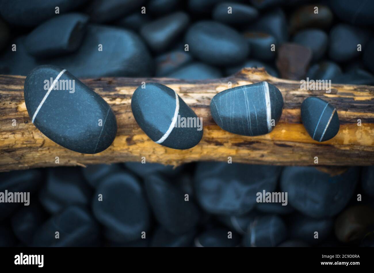 Slate cobbles balancing stones, UK Stock Photo - Alamy