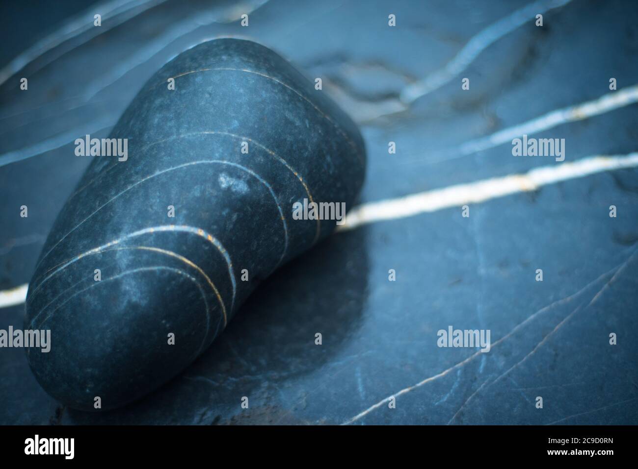 Slate cobbles balancing stones, UK Stock Photo - Alamy