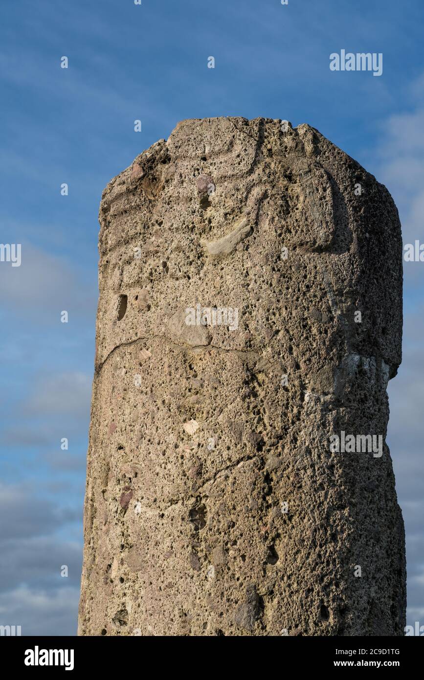 A carved column from the Temple of Two Columns on the North Platform of ...