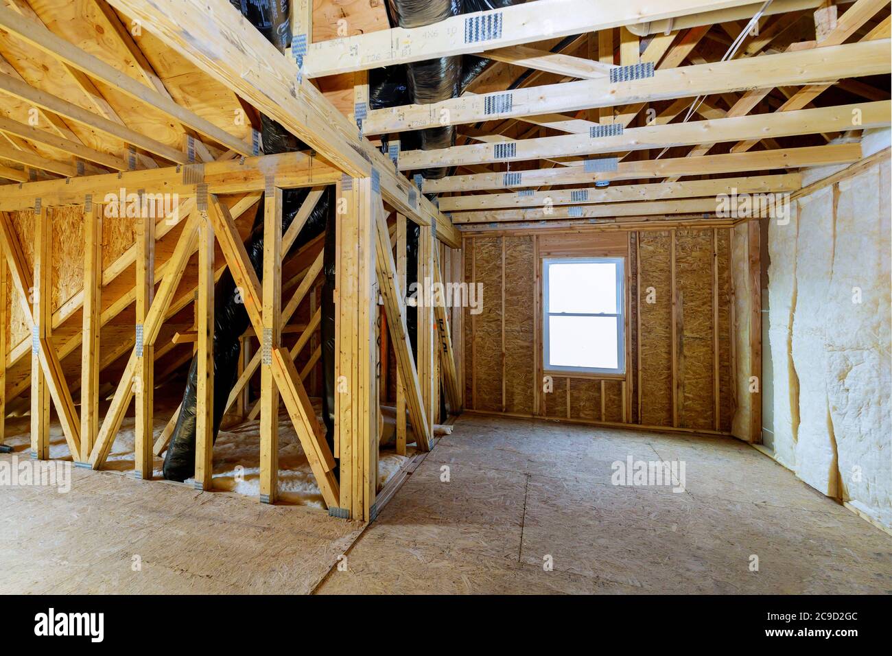 House in unfinished under construction in insulation foam the wall ...