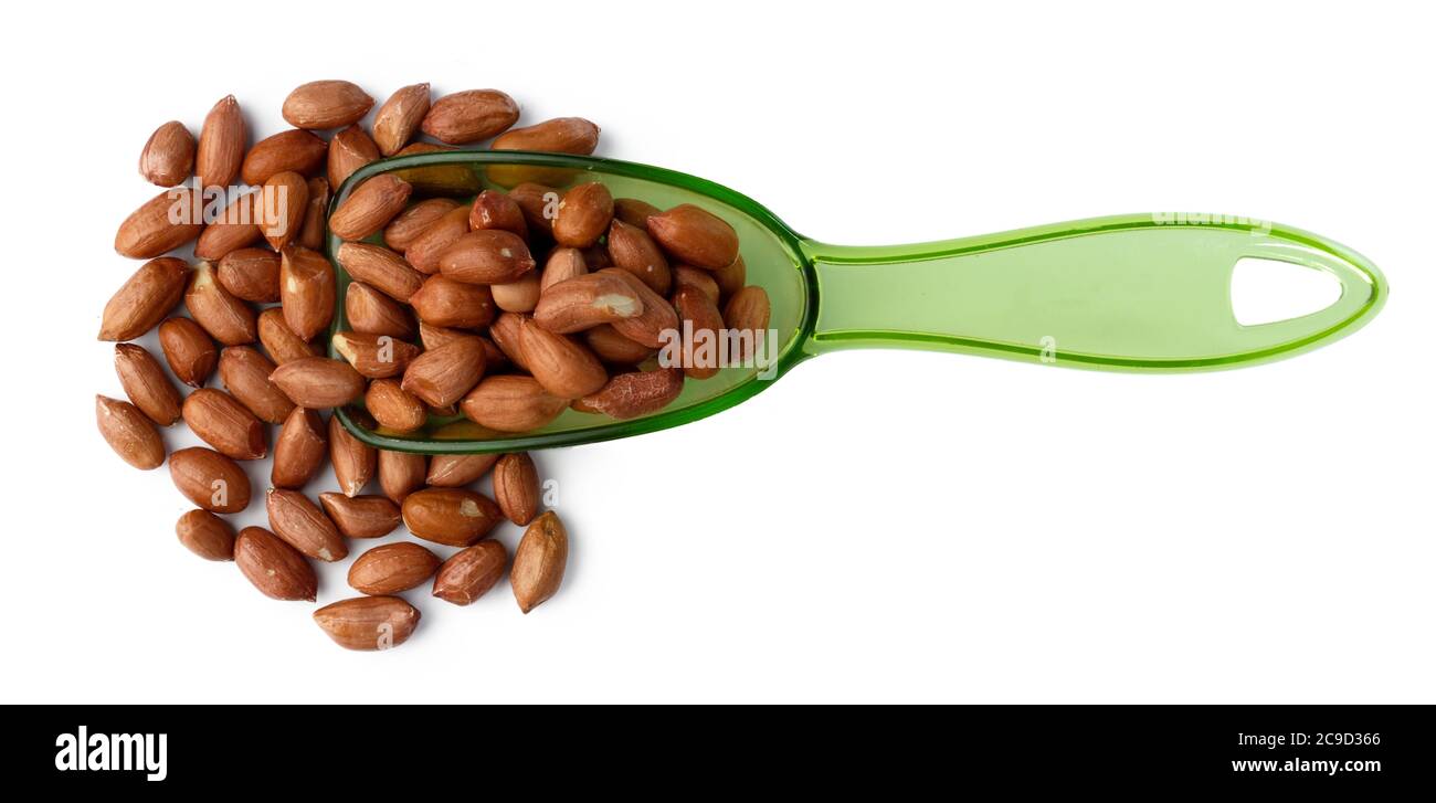 Spoon with peanuts isolated on white background Stock Photo - Alamy