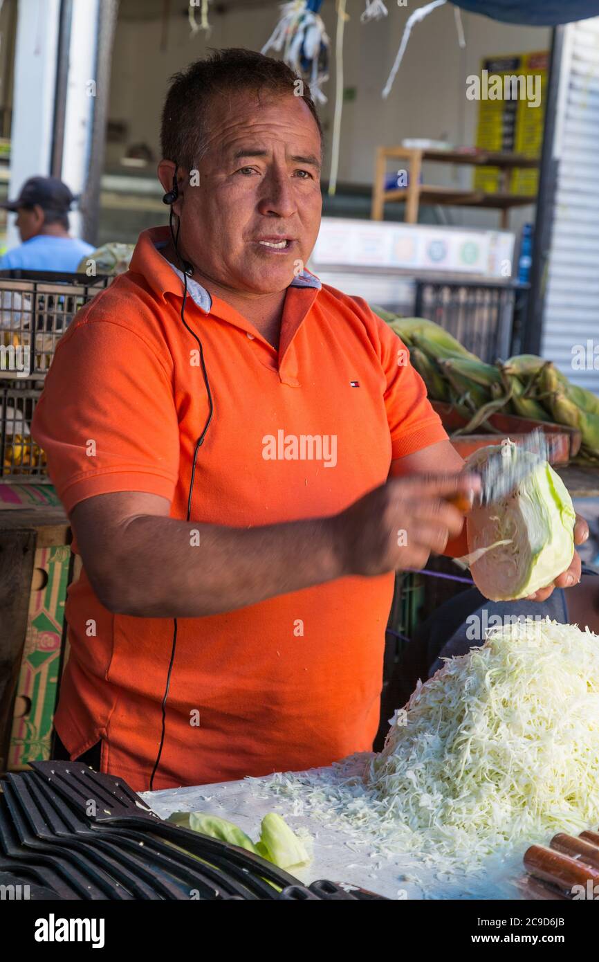 Ciudad Juarez, Chihuahua, Mexico. Cabbage Vendor Shredding Cabbage ...