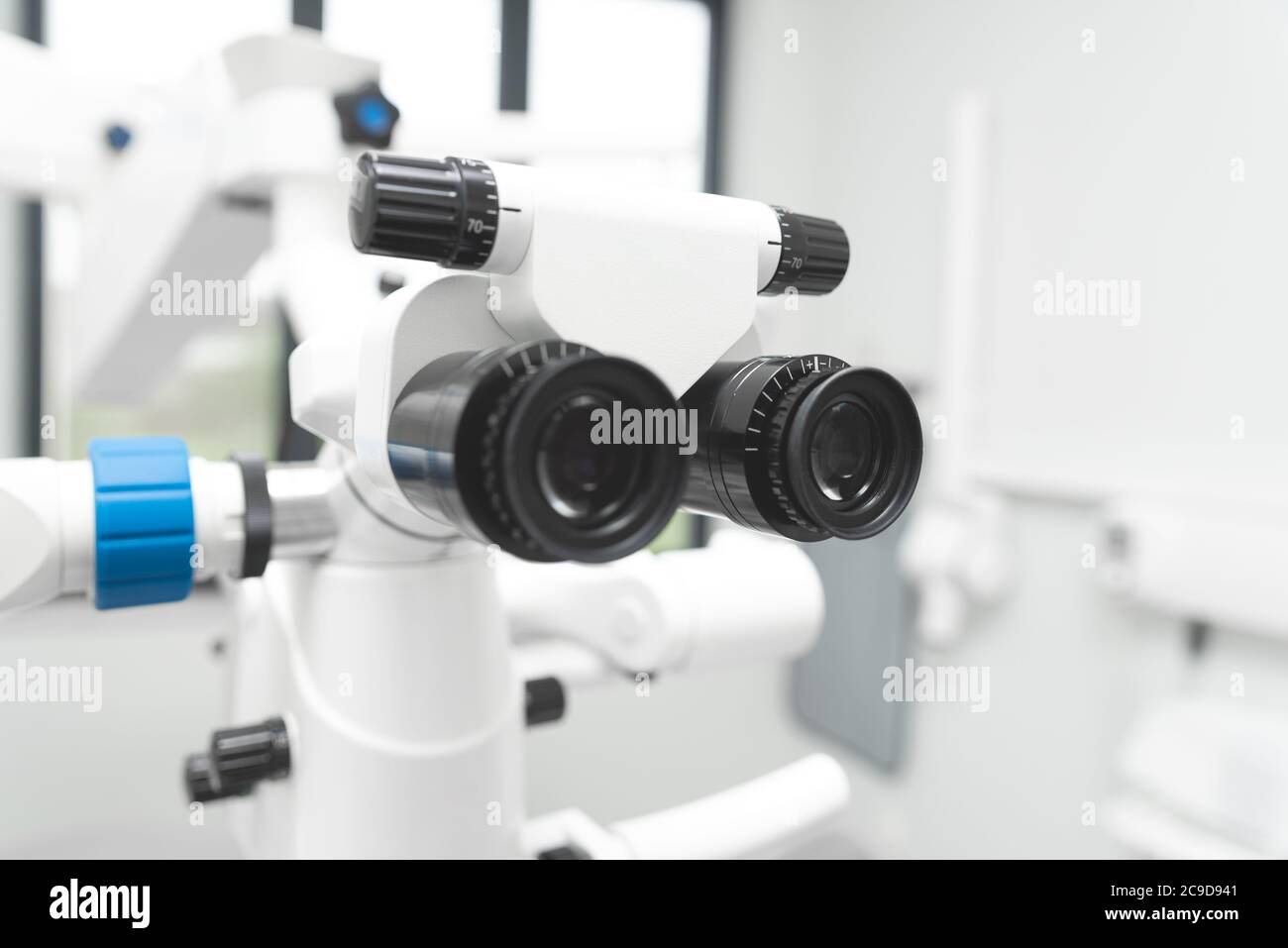 Dental endodontic binocular microscope. Closeup of a dentist microscope ...