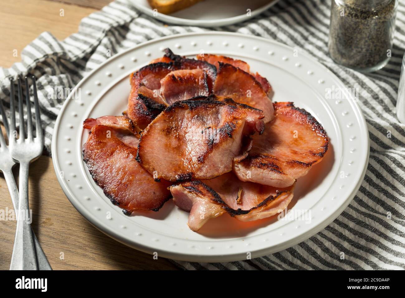 Homemade Cooked Canadian Bacon to Eat for Breakfast Stock Photo - Alamy