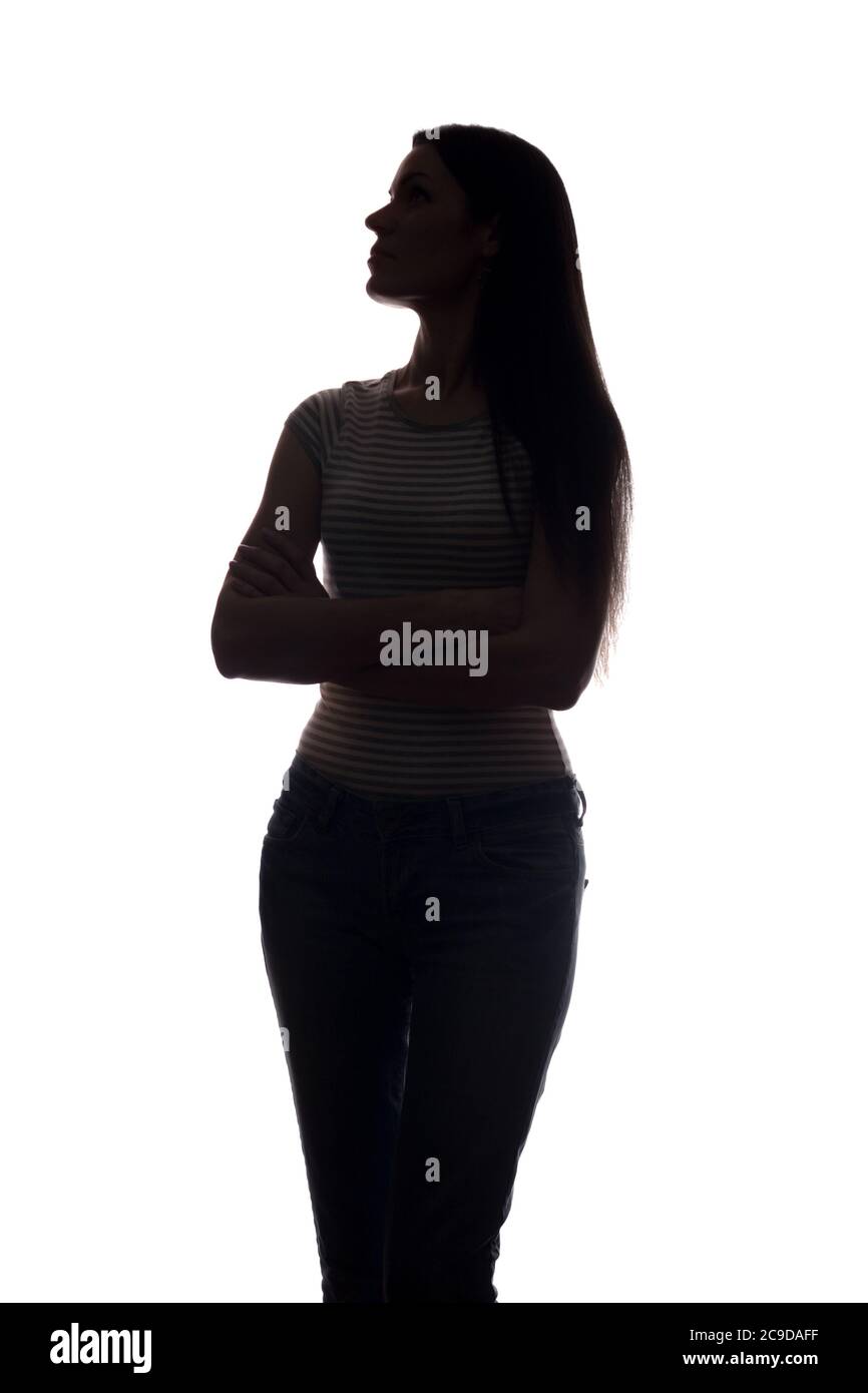 Young woman look ahead - vertical silhouette of a side view Stock Photo ...
