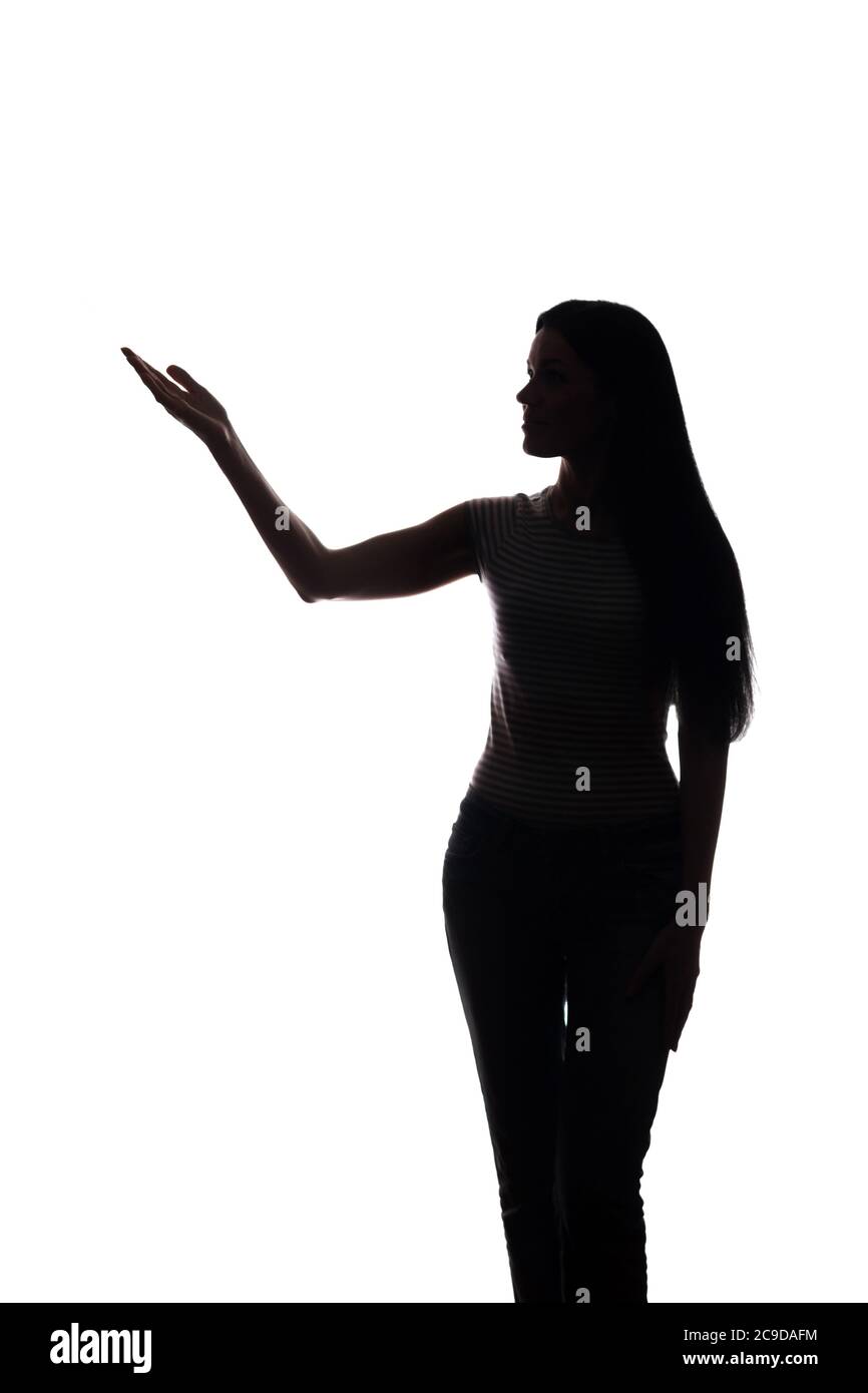 Young woman in suit shows his index finger, hand forward - silhouette ...