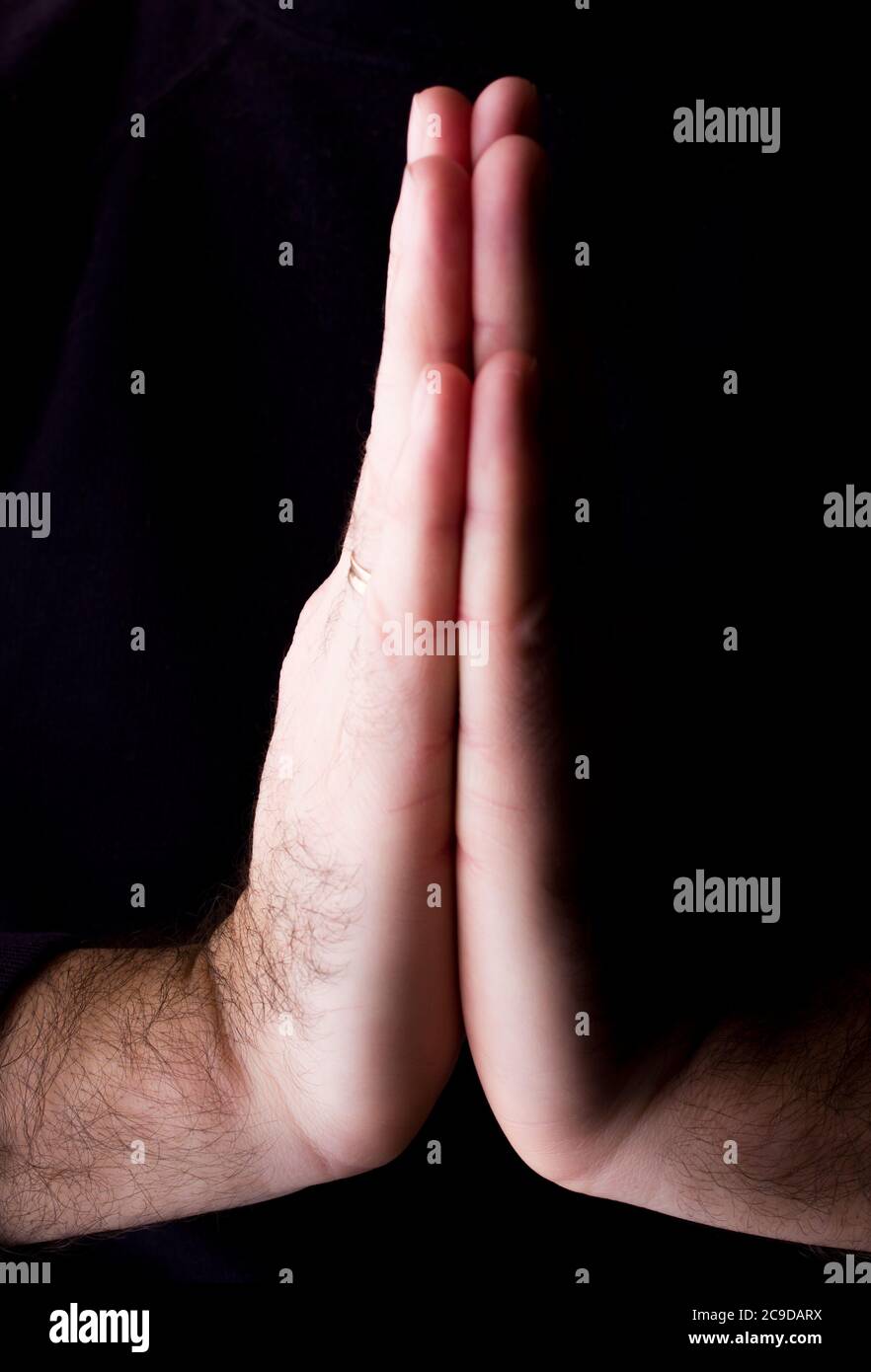 Mans Hand Together Prayer And Request Silhouette Isolate Stock