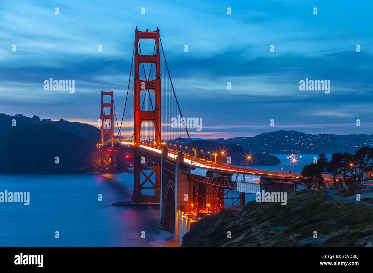 The Golden Gate Bridge light up at nightfall, San Francisco, California ...