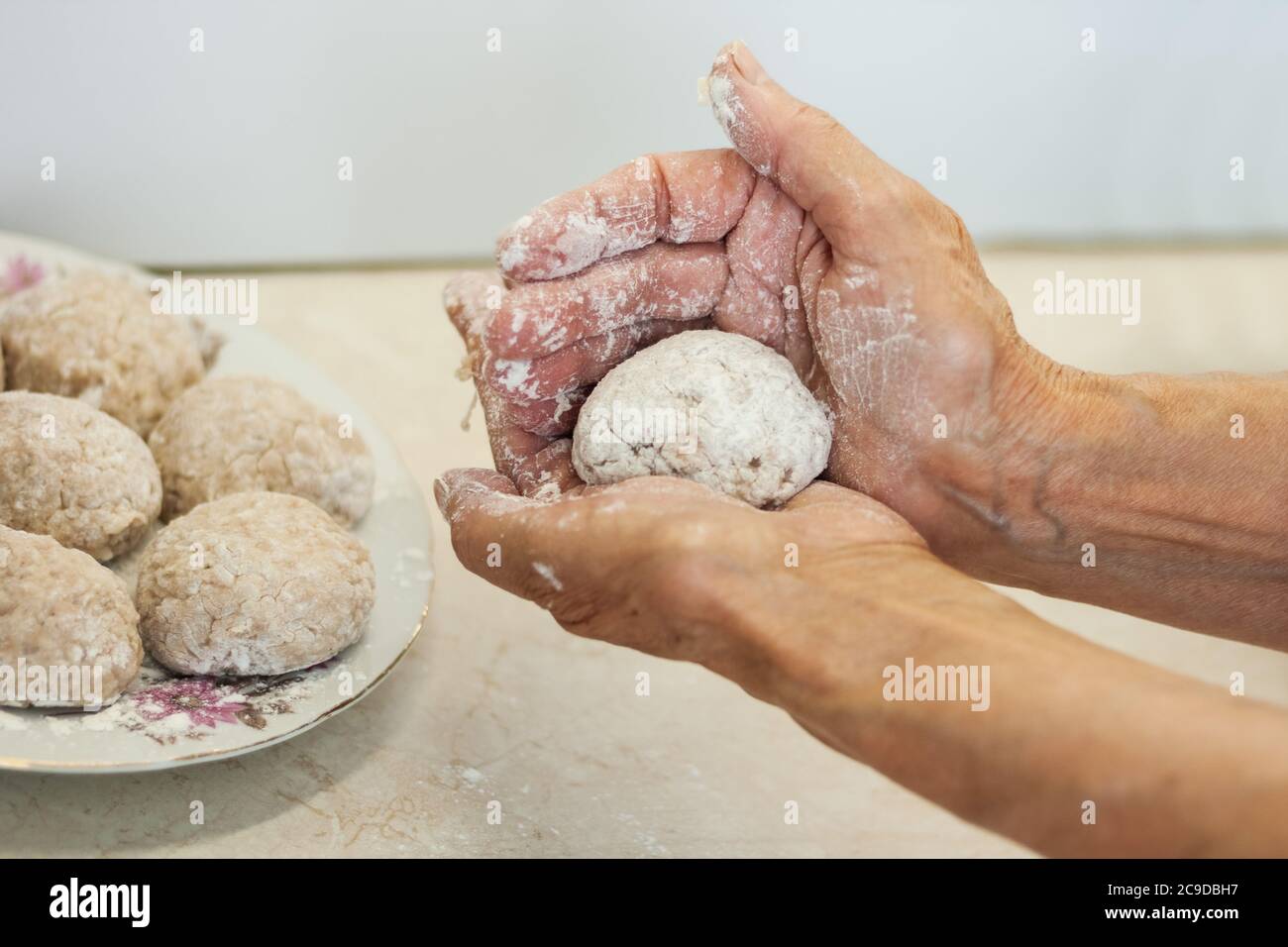 homemade meatballs - female hands make minced meatballs - traditional ...