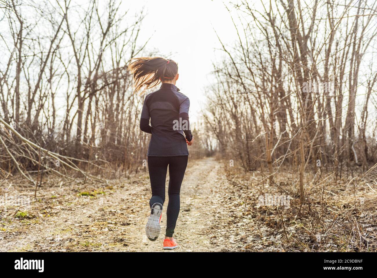Trail runner woman cross hi-res stock photography and images - Alamy