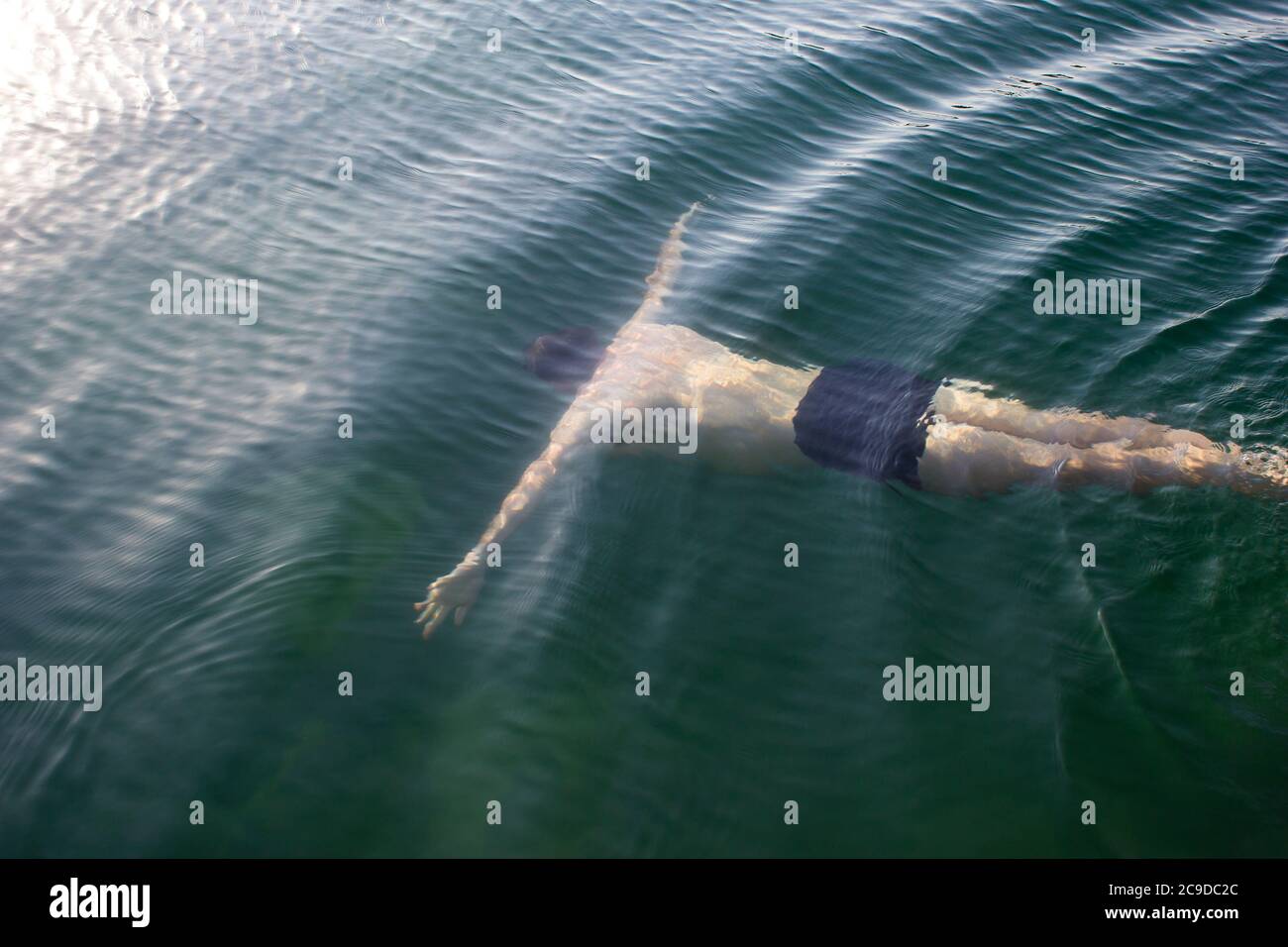 Male young swimmer underwater - background summer sunny sea, swimming ...