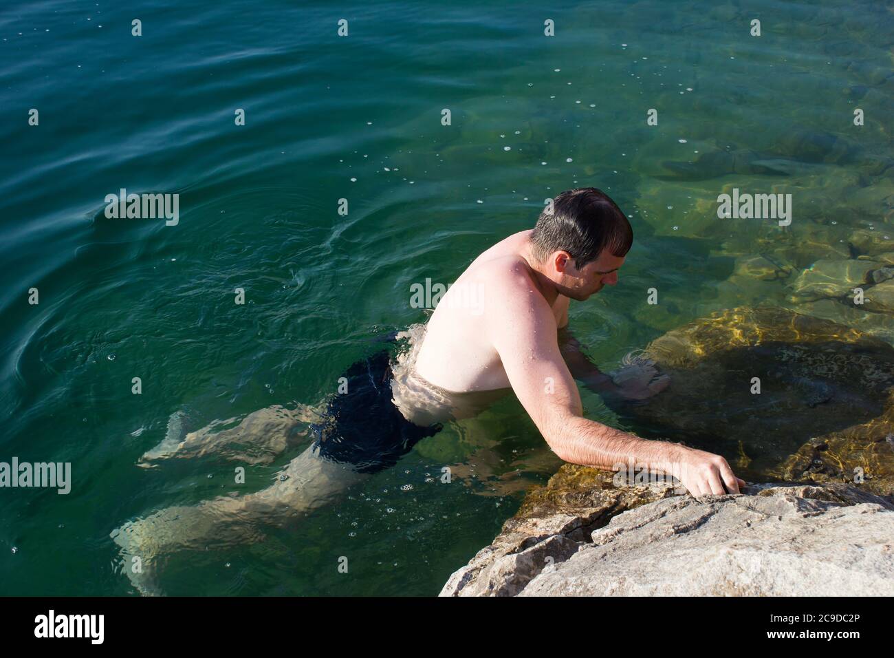 Man back swimmer swimming hi-res stock photography and images - Alamy