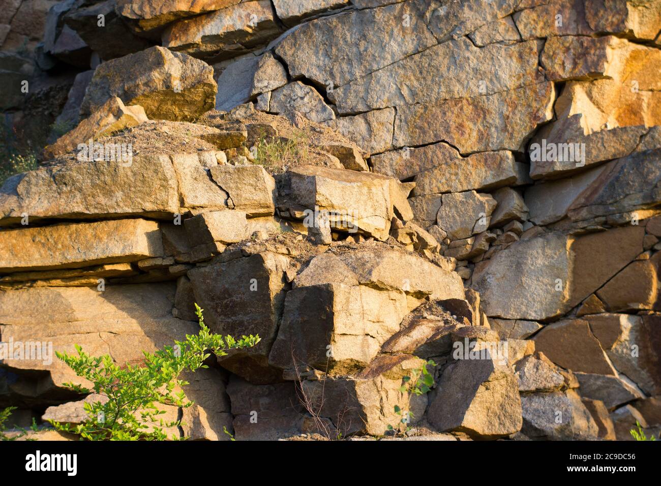 Texture of a large granite rock made of stones - marble stone quarry ...