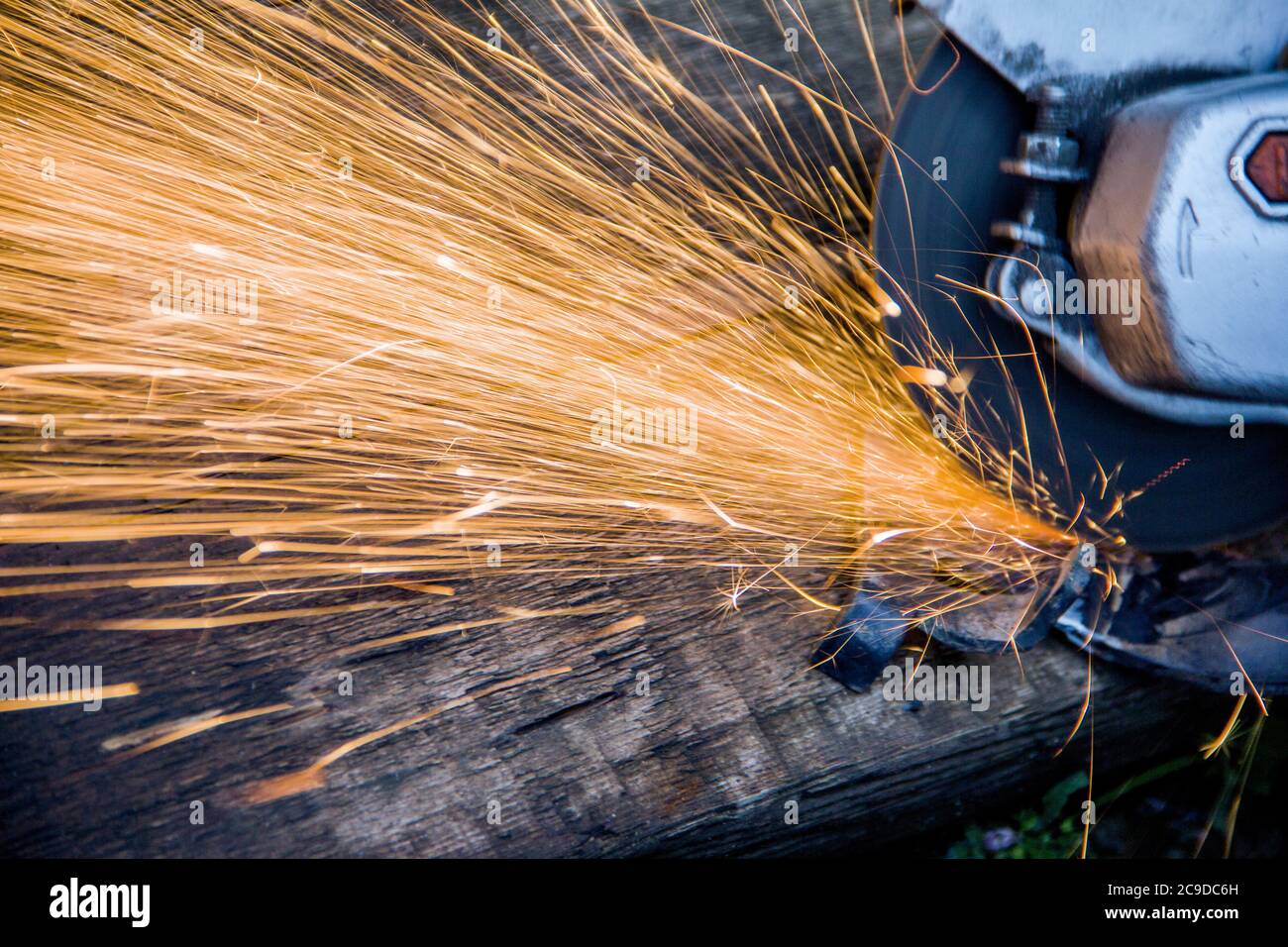 flow of flying sparks when working a circular saw for metal Stock Photo ...